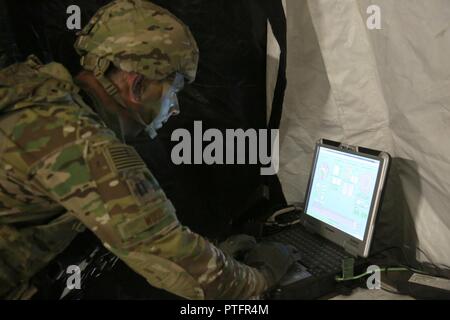 Air Force Capt. Ben Wood, assigned to the 7th Expeditionary Weather ...