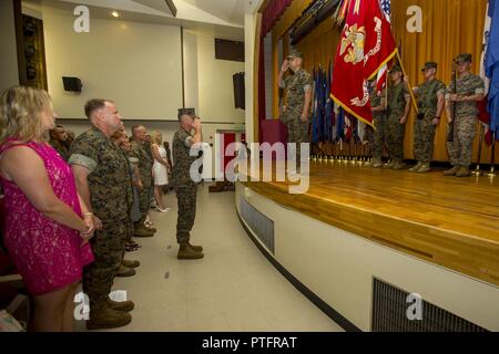 U.S. Marines and their families attend the 21-Minute Gun Salute on ...