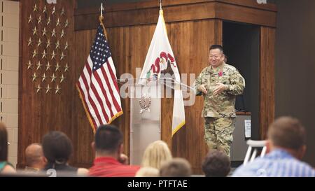 Col. Peter Kim, Senior Advisor to the Army National Guard speaks to ...