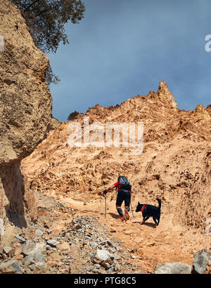 man hiker with backpack in canyon with forest Dovbush rocks Ukraine ...