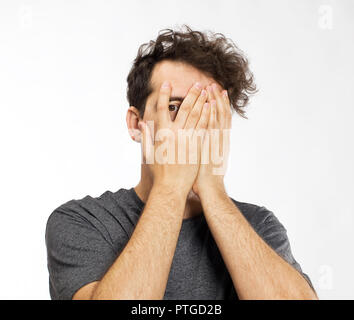 Man Blocking Face with Hands Stock Photo - Alamy