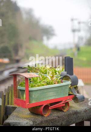 Miniature railway in the garden Stock Photo - Alamy