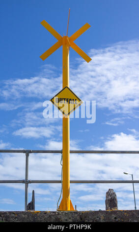 yellow coastal navigation markers showing or warning of an underwater ...