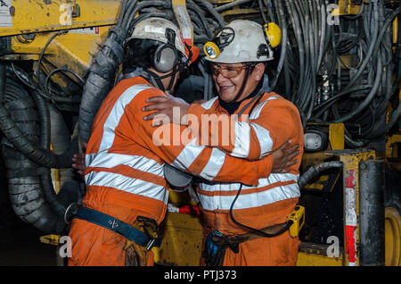 Miners' outfit with mask and helmet, safety suit on display at Coal ...
