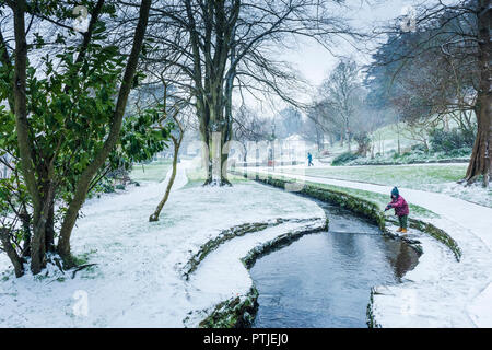 Snow falling in Trenance Gardens in Newquay Cornwall Stock Photo ...