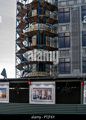 Hanging building facade with scaffolding Stock Photo - Alamy