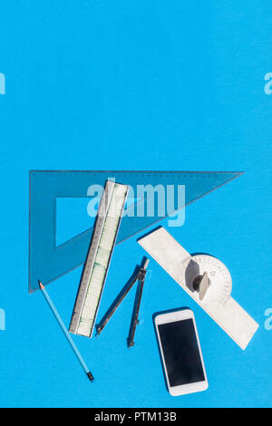 Blue transparent compass with pencil isolated on a white background ...