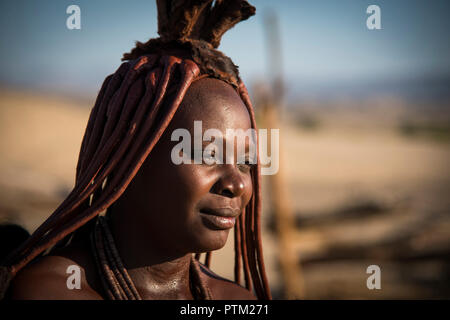 A Himba lady who lives in a traditional camp situated near to Purros in ...
