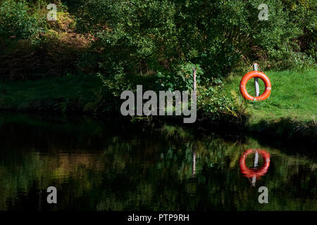 Quick sand letters on beach Stock Photo - Alamy