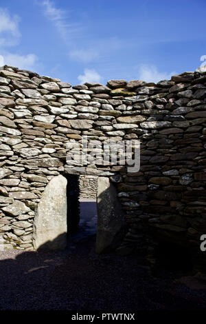 Primitive clochán (beehive hut) dwelling on the Dingle Peninsula in ...