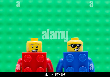 Two Lego minifigures - one scared and one happy Stock Photo - Alamy