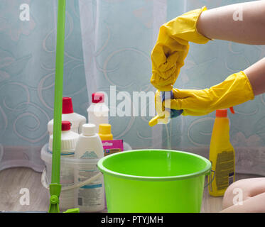 A dirty rag in a blue bucket full of water Stock Photo - Alamy