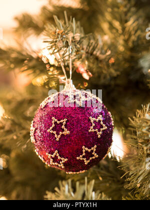 closeup of hanging christmas snowflakes and stars decorations, on the ...
