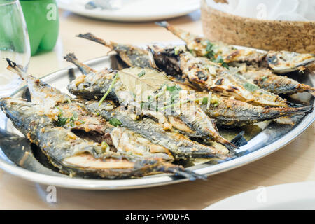Silver tray full of delicious fish mackerel known as carapau in ...