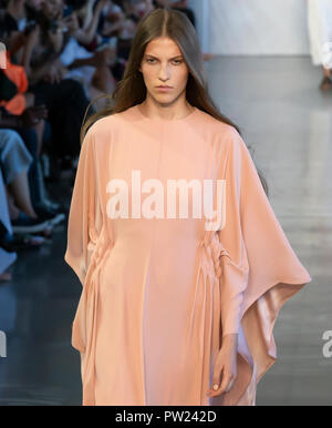 Model Silke Van Daal walks on the runway during the Christopher Kane ...