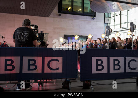 A BBC cameraman operates his equipment during a rehearsal for an ...