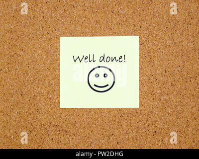 well done written on a post it note memo Stock Photo - Alamy