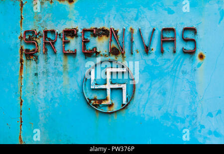 Detail of hindu temple with swastika symbol, Indonesia Stock Photo - Alamy
