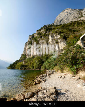 Vertical shot of some small rocks at a beach near a sea Stock Photo - Alamy