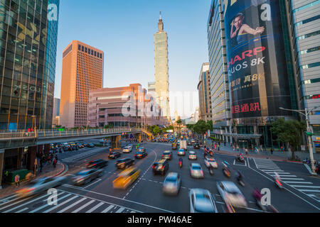 Taiwan, Taipei, traffic in front of Taipei 101 at a busy downtown ...