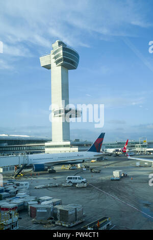 The JFK International airport air traffic control tower with Stock ...