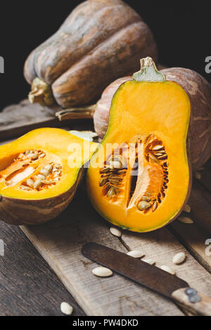 Fresh whole and half butternut pumpkins Stock Photo - Alamy
