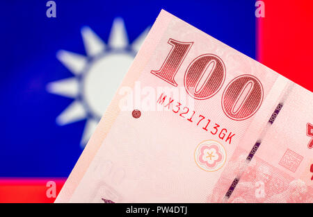 Taiwan currency notes , Taiwan currency on Taiwan flag Stock Photo - Alamy