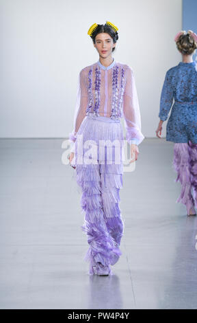 Model - Catwalk - Marcel Ostertag fashion show at Mercedes Benz Fashion ...