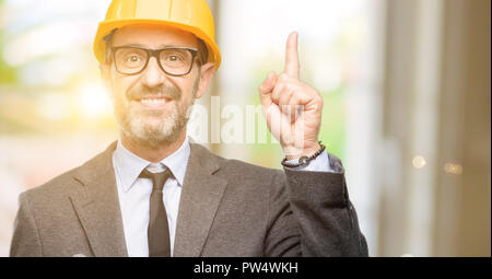 Senior architect or engineer happy and surprised cheering expressing ...