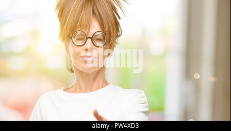 Nerd shaking hands Stock Photo - Alamy