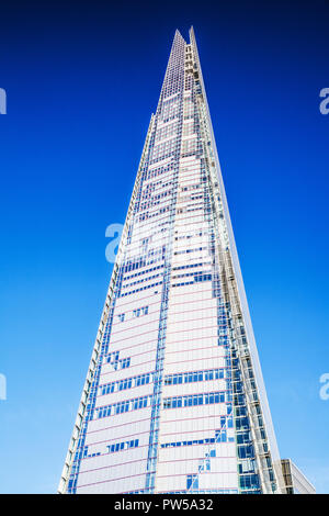 The Shard, a spire-like supertall skyscraper at sunset, Southwark ...