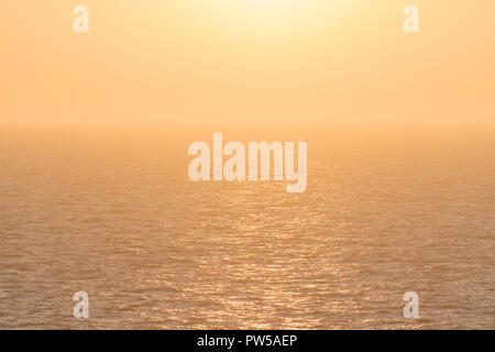Sunset over the sea Stock Photo - Alamy