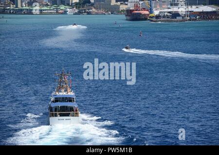 The crew of the coastal patrol boat USCGC Haddock (WPB 87347) tows a ...