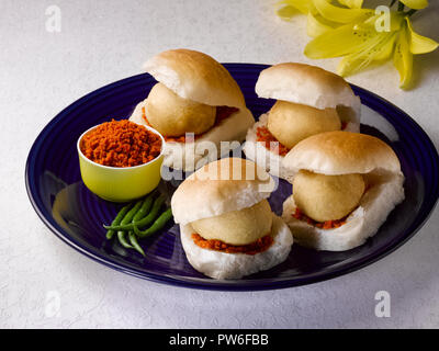 Vada pav or wada pao is a vegetarian fast food dish native to the state ...