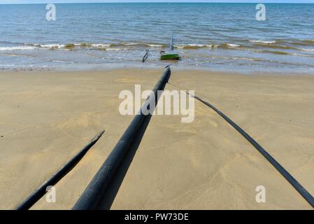 Sea water intake pipe at the beach Stock Photo - Alamy