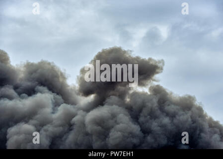 Forms and shapes in a cloud of toxic pollution smoke from a factory ...