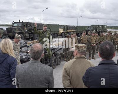Finnish Air Force Lt. Col. Inka Niskanen (left), commanding officer of ...
