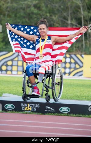 U.S. Army Capt. Kelly Elmlinger (left), San Antonio and U.S. Army Staff ...
