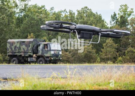 A joint tactical autonomous air resupply systems (JTAARS) carries a ...