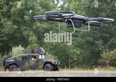 A joint tactical autonomous air resupply systems (JTAARS) carries a ...