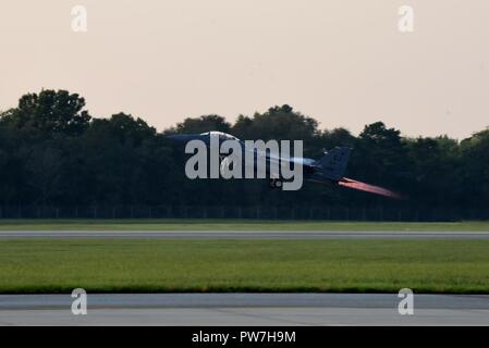 A 336th Tactical Fighter Squadron F-15E Eagle aircraft is readied for ...