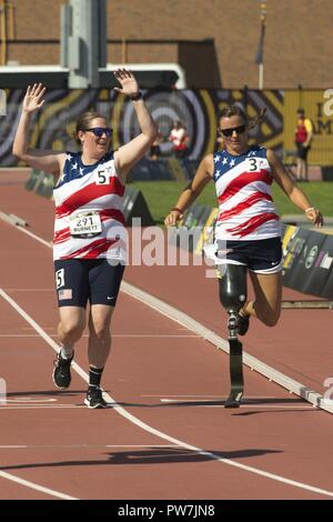 US Team captain Capt. Christy Wise, U.S. Air Force, carries the ...