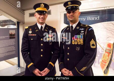 U.S. Army Soldiers pose with their Basic Leader Course certificate ...