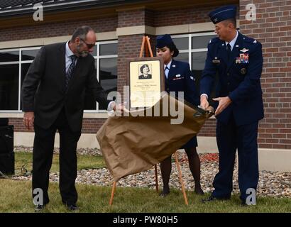 Col. John R. Edwards, commander of the 28th Bomb Wing, unveils his name ...