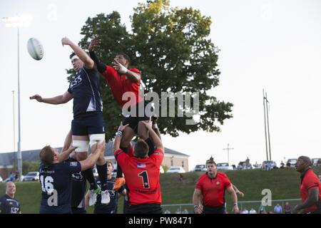 U.S. Marines assigned to the All Marine Rugby Team stand together ...