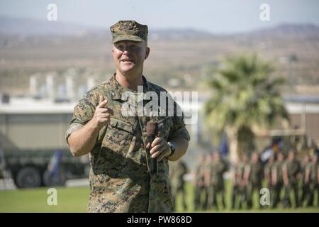 U.S. Army Lt. Col. Avery J. Carney, left, U.S. Army Health Clinic ...