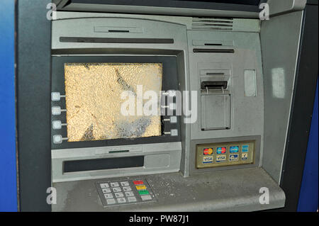 Smashed and broken ATM screen Stock Photo - Alamy