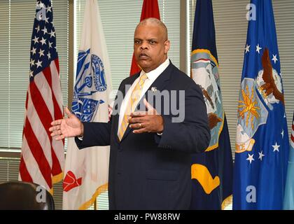 U.S. Navy Rear Adm. Sinclair Harris, left, the commander of U.S. 4th ...