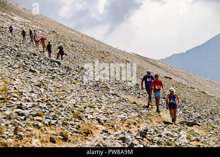 Marathon runners at 2.850 m. height, on the way of the E4 European long ...