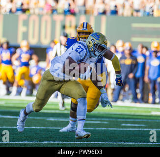 UCLA running back Joshua Kelley runs a drill at the NFL football ...